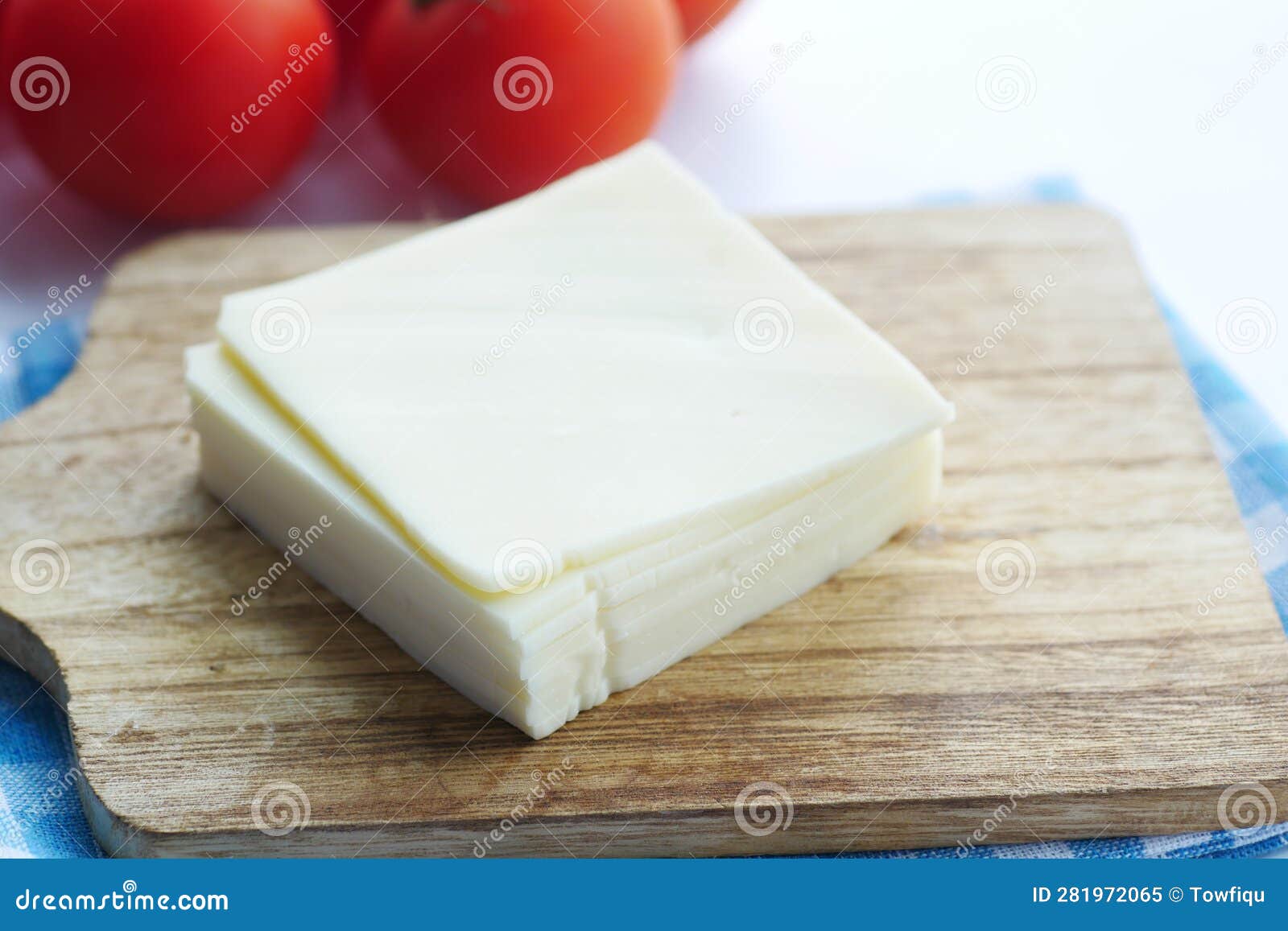Slicing Cheese into Pieces Closeup, Stock Image - Image of milk ...