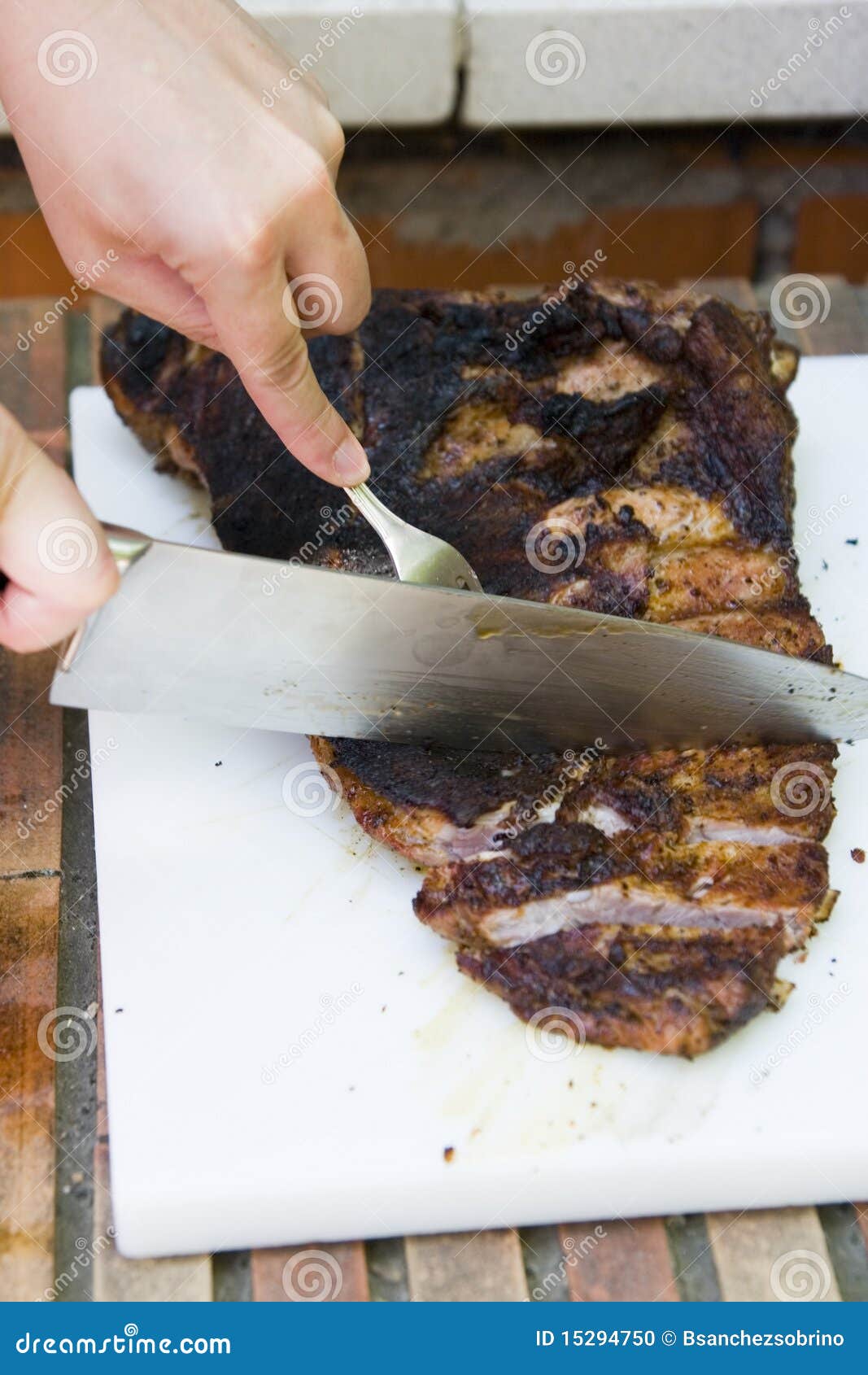 Slicing cooked meat stock photo. Image of steak, cutting - 15294750