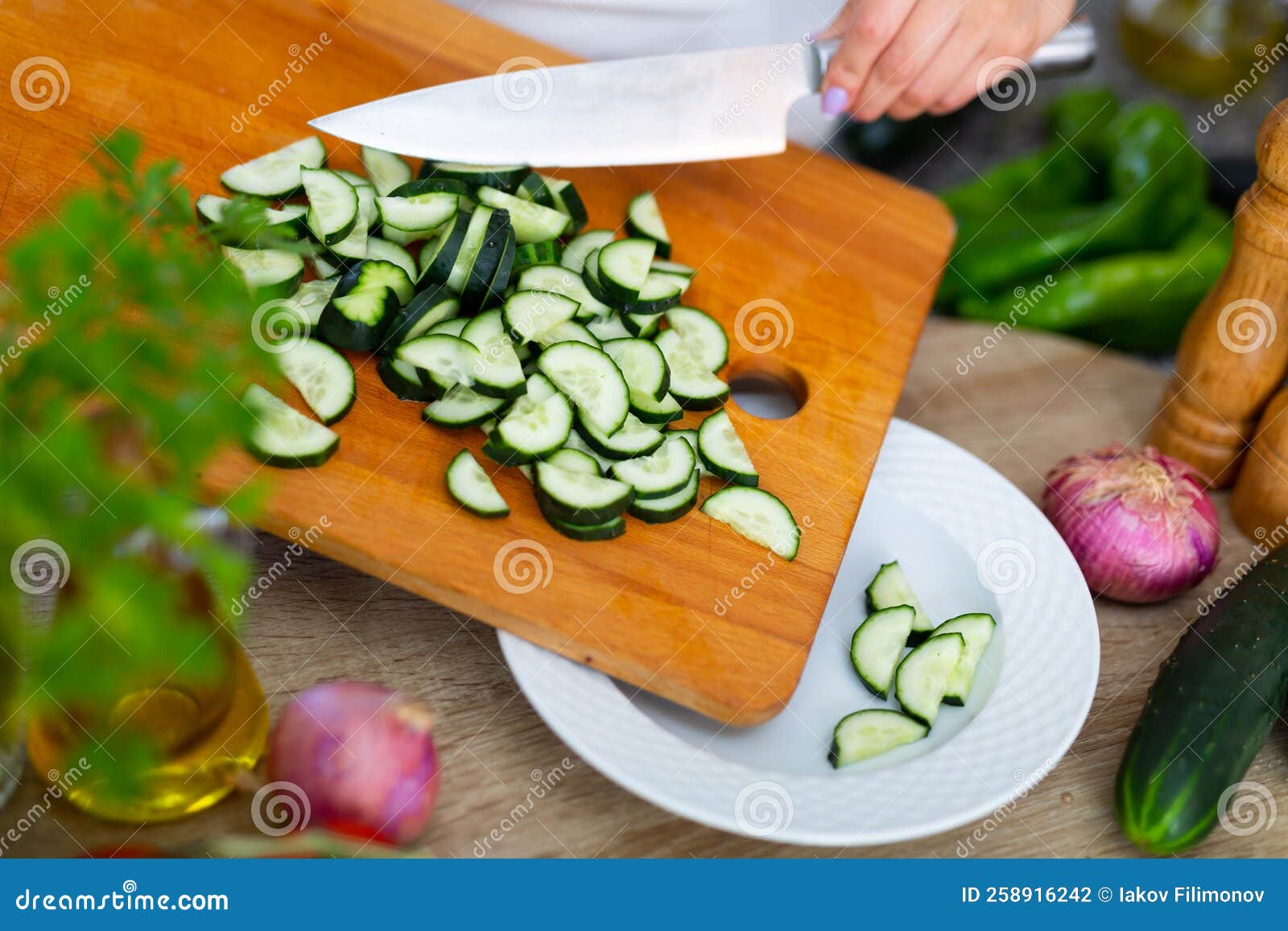 Slicing Fresh Cucumber on Cutting Board Stock Photo - Image of cutting ...