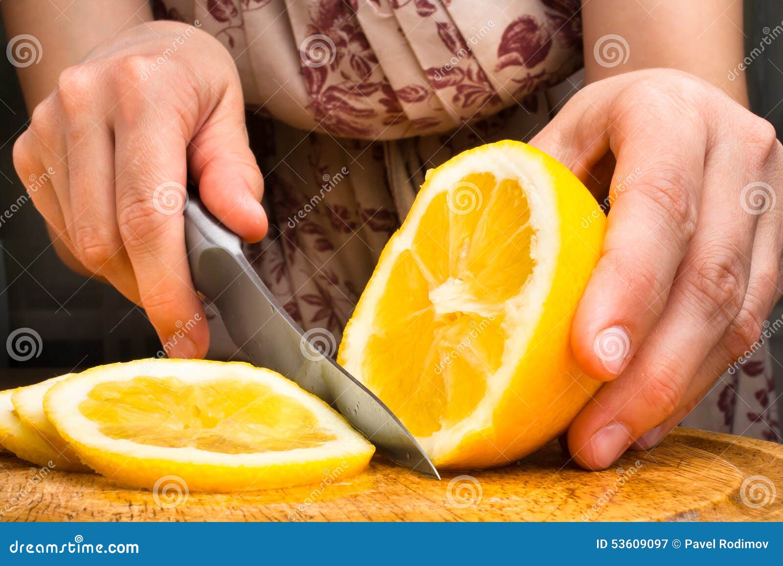 Slicing Lemon on the Cutting Board with Knife Stock Image - Image of ...