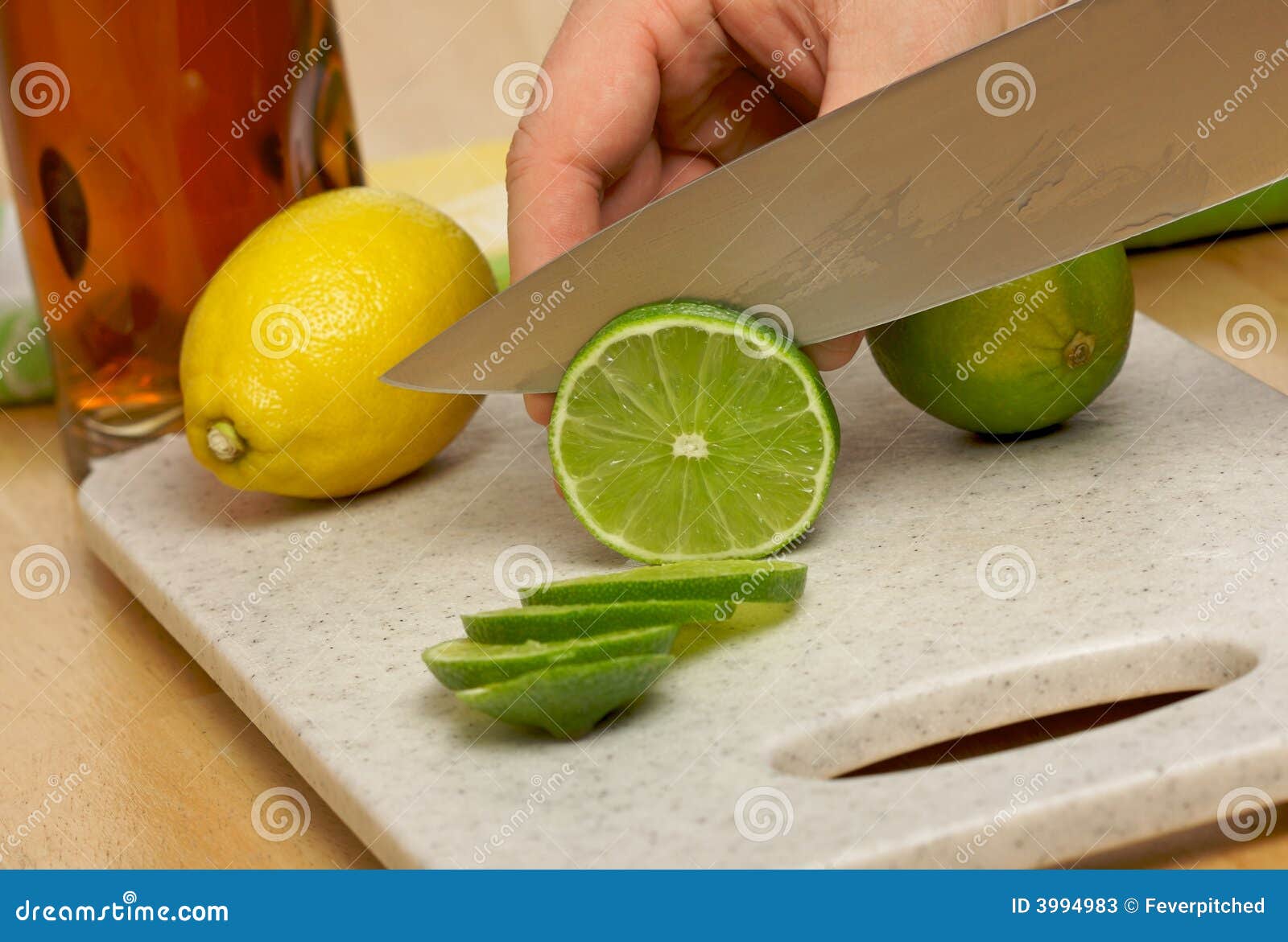 Slicing a Lime stock image. Image of health, nutritious - 3994983