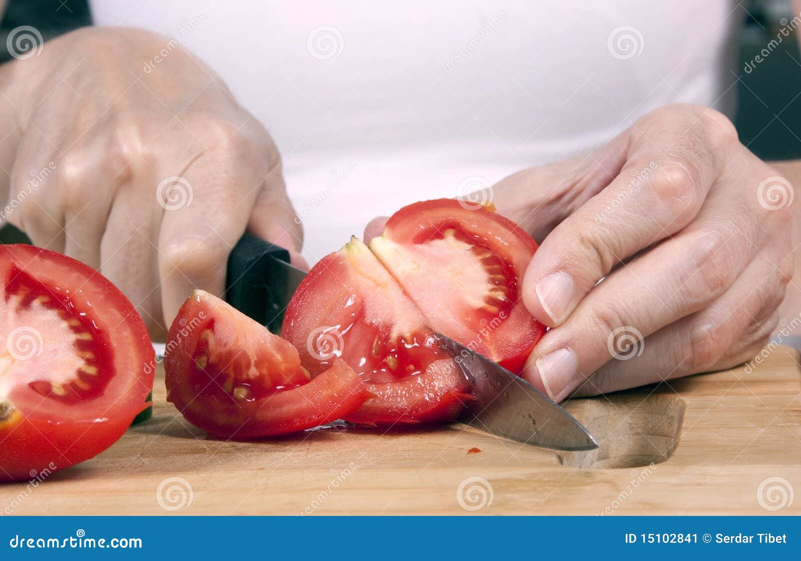 Slicing Tomatoes stock image. Image of garnish, closeup - 15102841