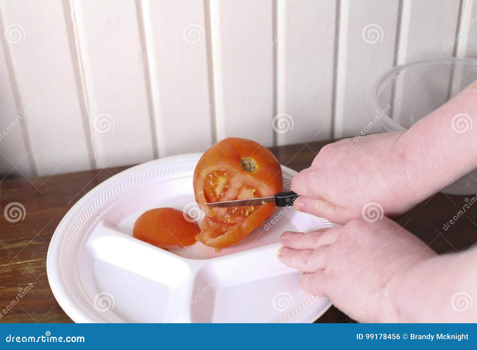 Slicing Tomatoes stock photo. Image of gluten, appetizing - 99178456