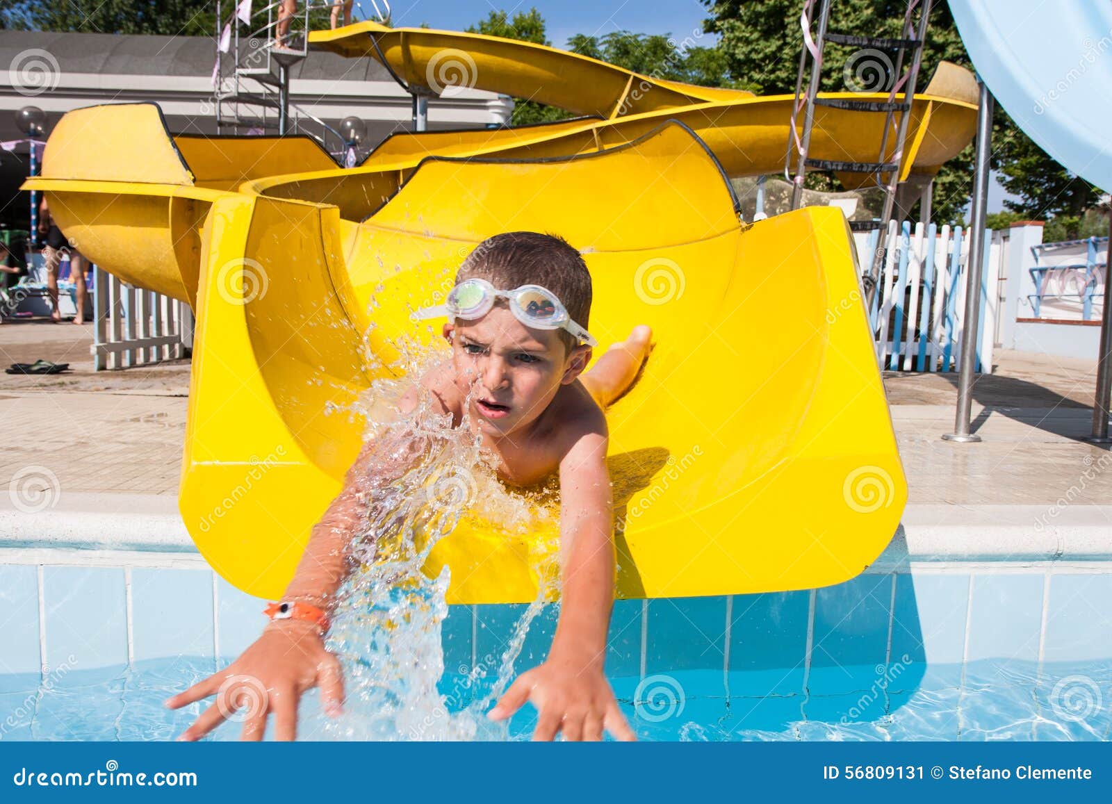 Slide in the pool stock image. Image of splashing, smiling - 56809131
