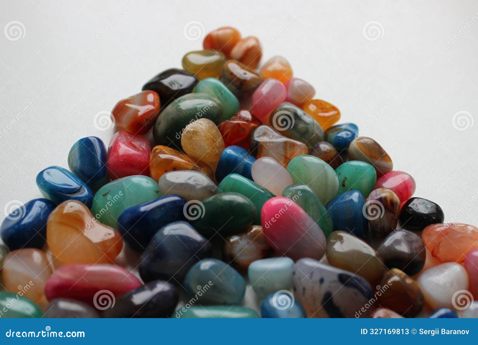 A Slide of Shiny Multi-colored Quartz Stones Isolated on White Stock ...