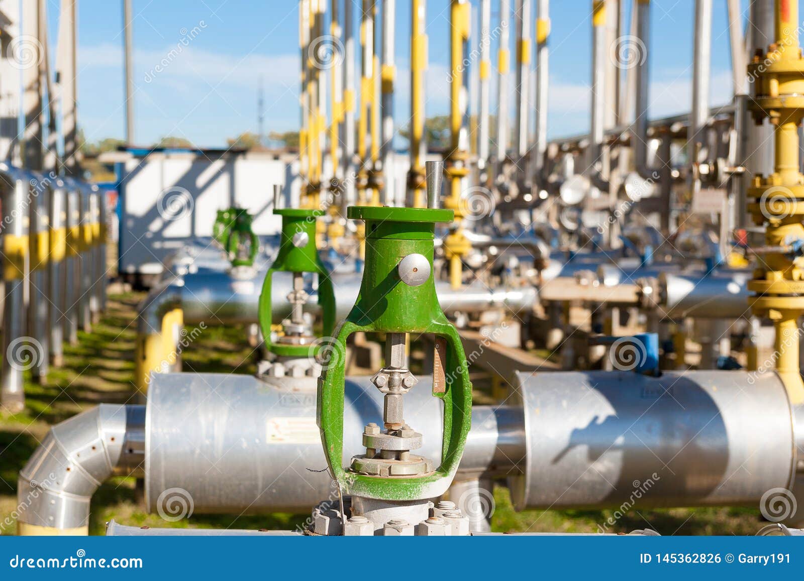 Slide Valves are on the Pipeline Stock Photo - Image of green, valve ...