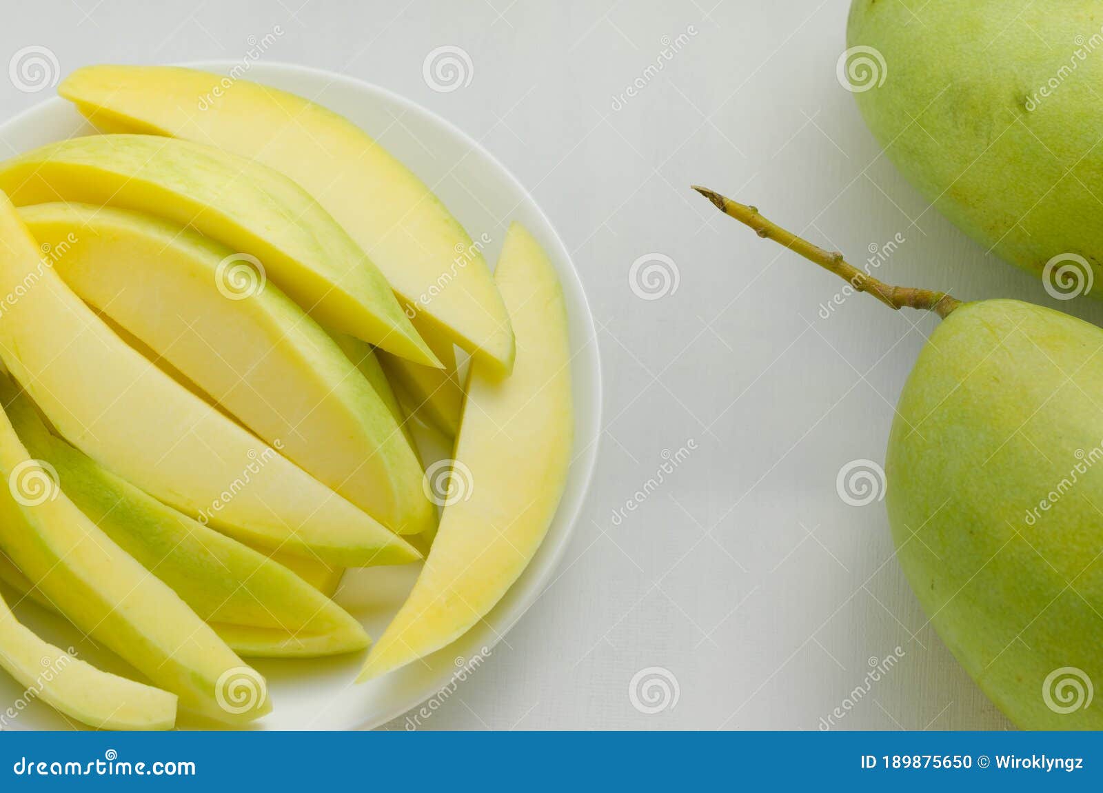 Sliced Mango in the White Plate. Stock Photo - Image of ripe, organic ...