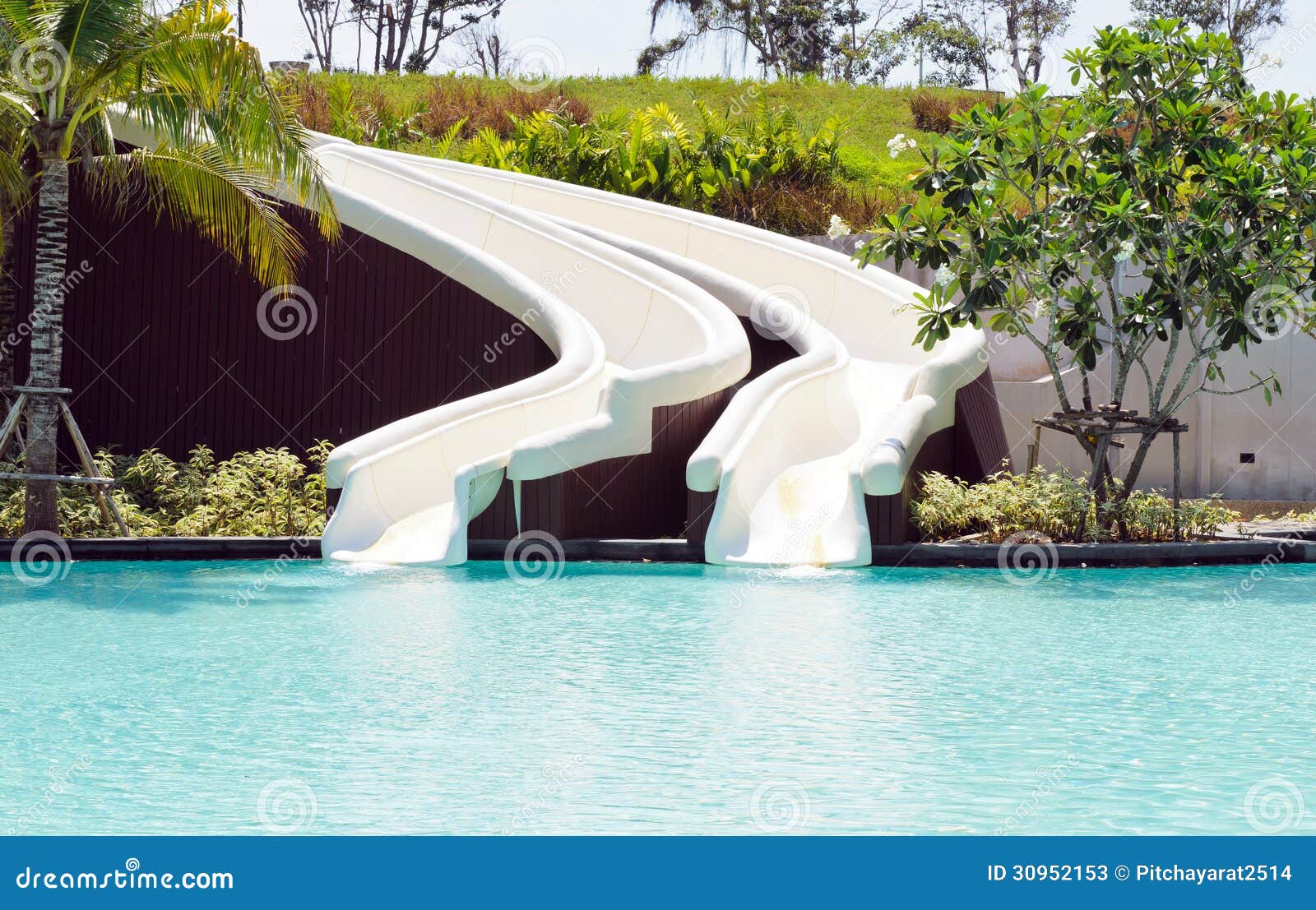 Slider in swimming pool stock image. Image of nature - 30952153