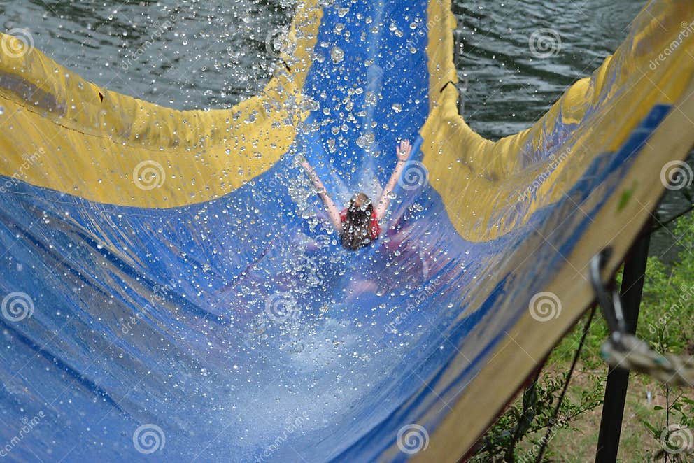 Sliding Down Camp Waterslide Stock Photo - Image of sliding, long: 67928024