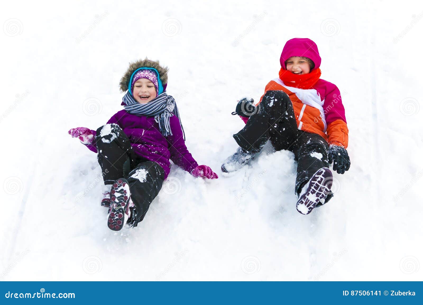 Sliding Together in Winter stock image. Image of happiness - 87506141