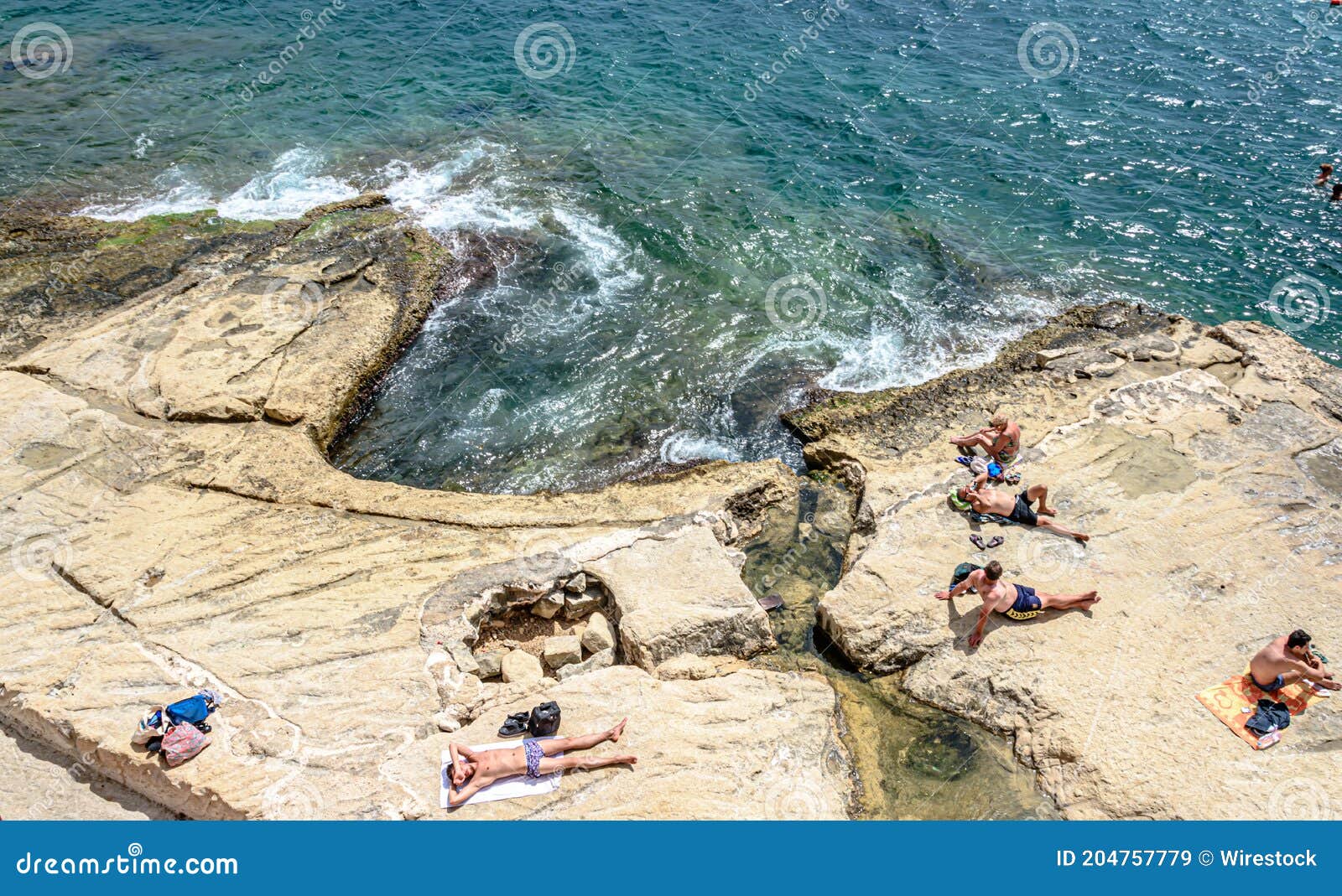 SLIEMA, MALTA - Aug 11, 2017: Tigne Point Beach, Silema, Malta ...
