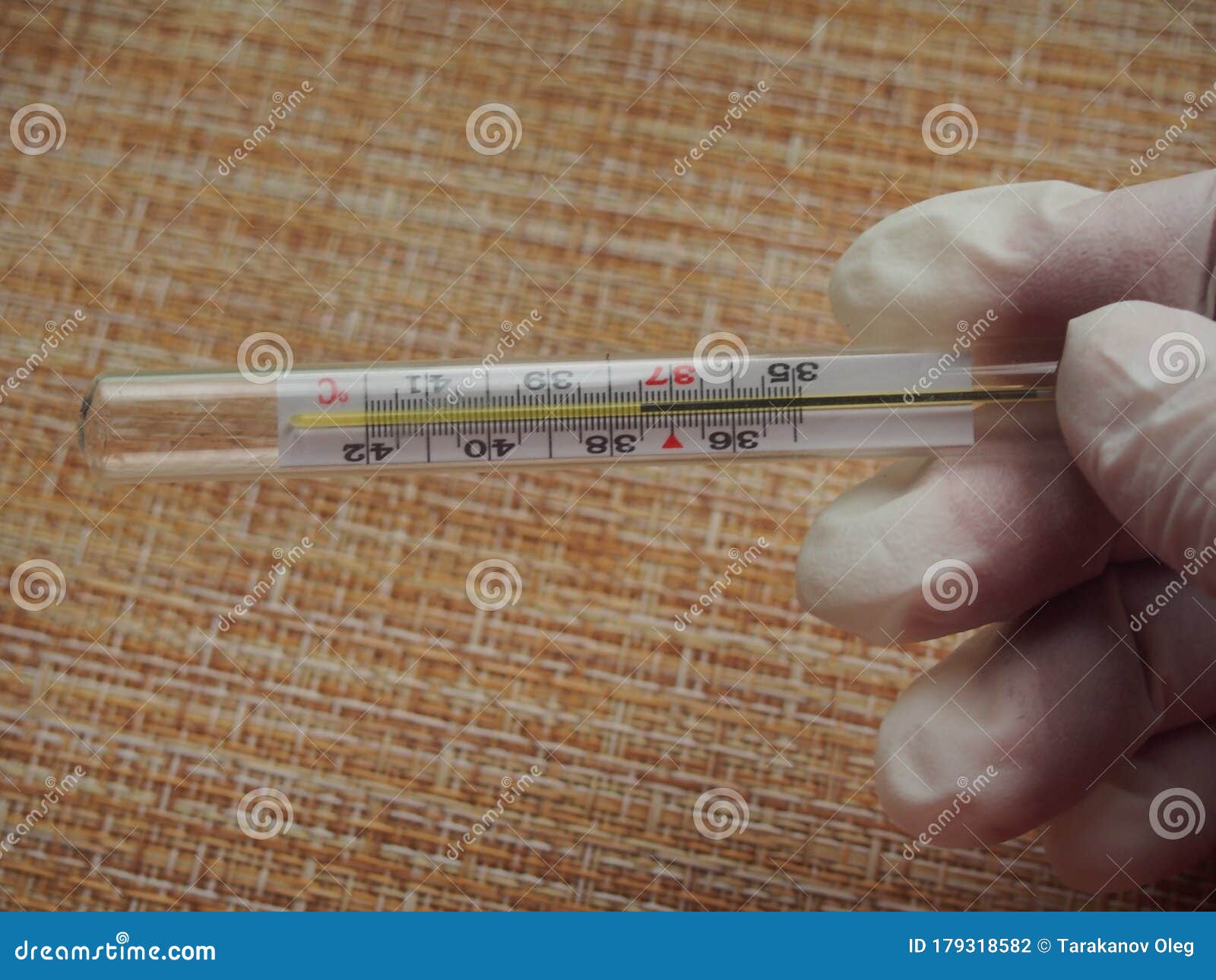 A Slight Increase in Temperature on the Thermometer. 37.5 Degrees ...