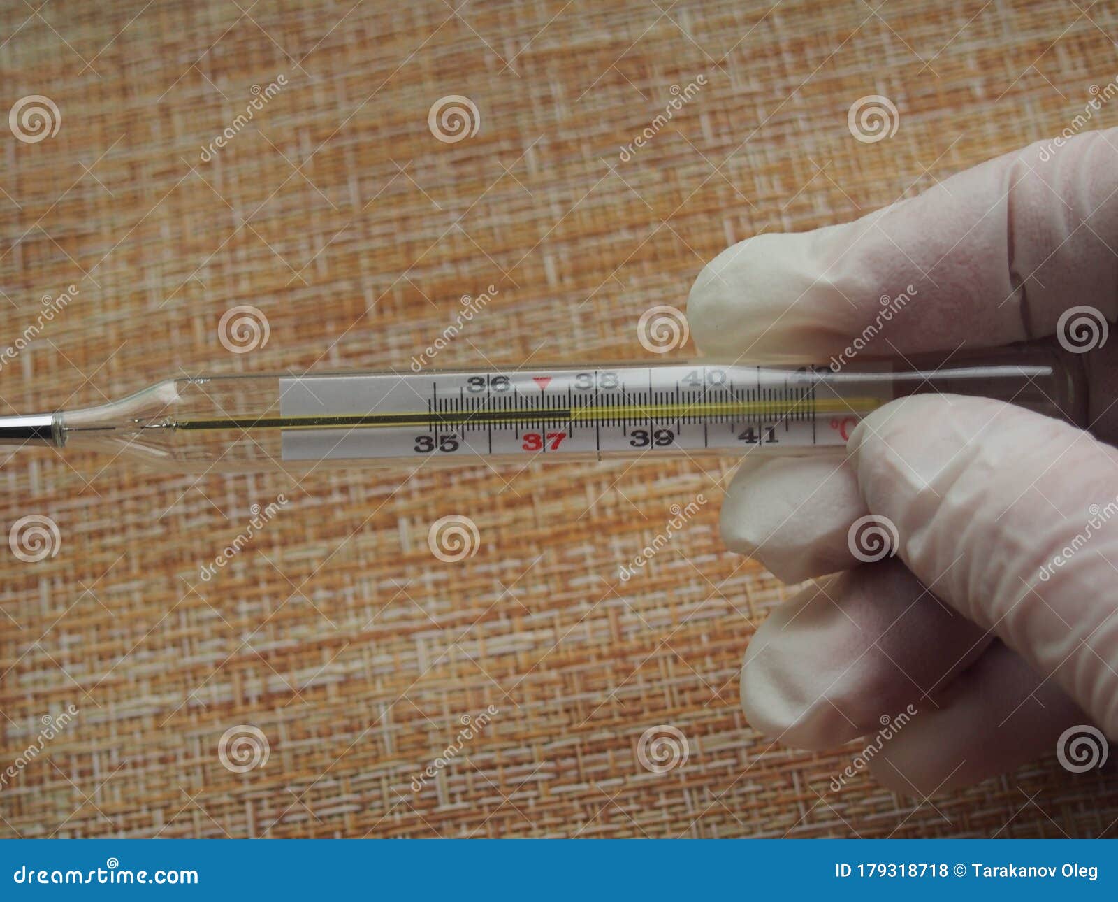 A Slight Increase in Temperature on the Thermometer. 37.5 Degrees ...