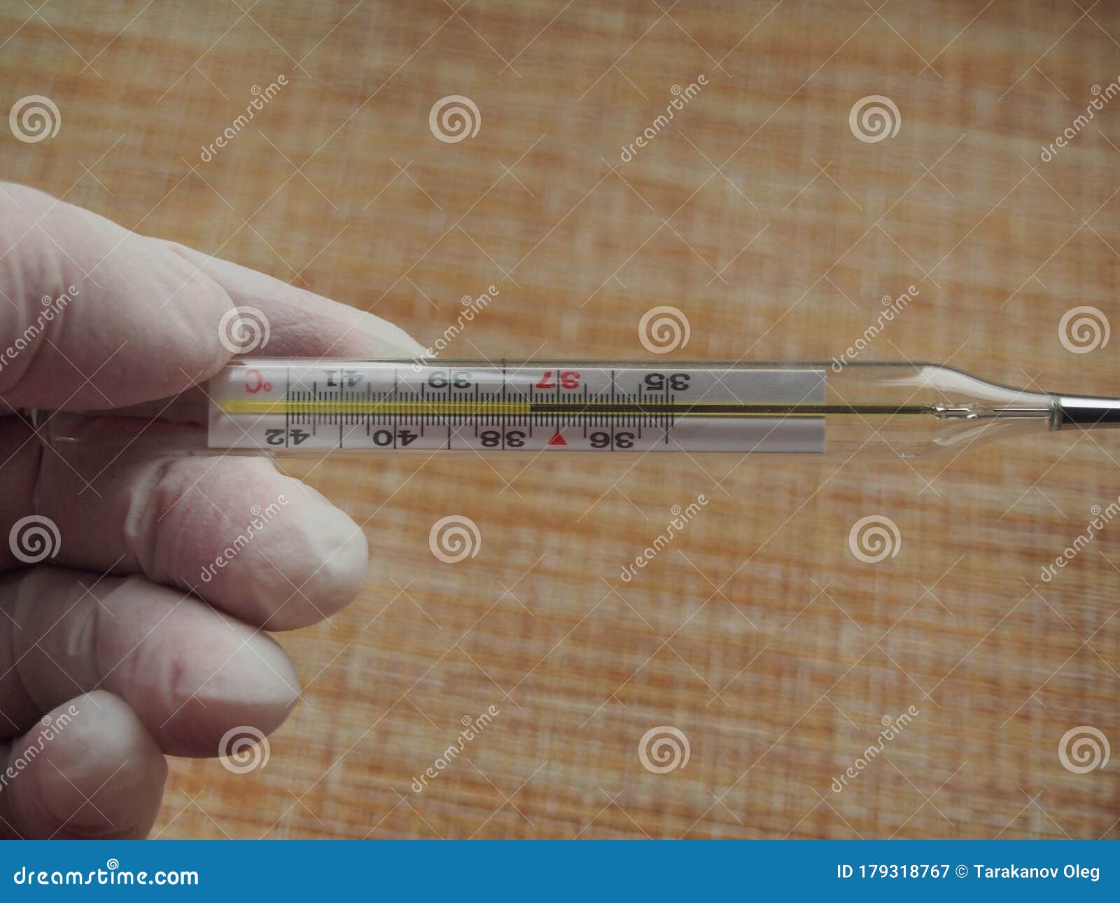 A Slight Increase in Temperature on the Thermometer. 37.5 Degrees ...