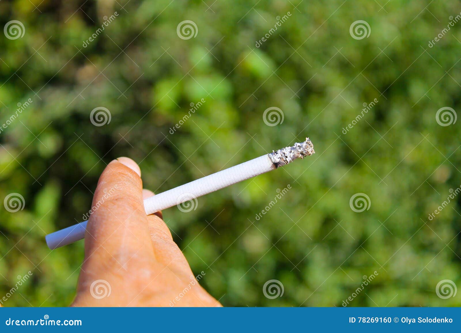 Slim cigarette in hand stock photo. Image of health, cancer - 78269160