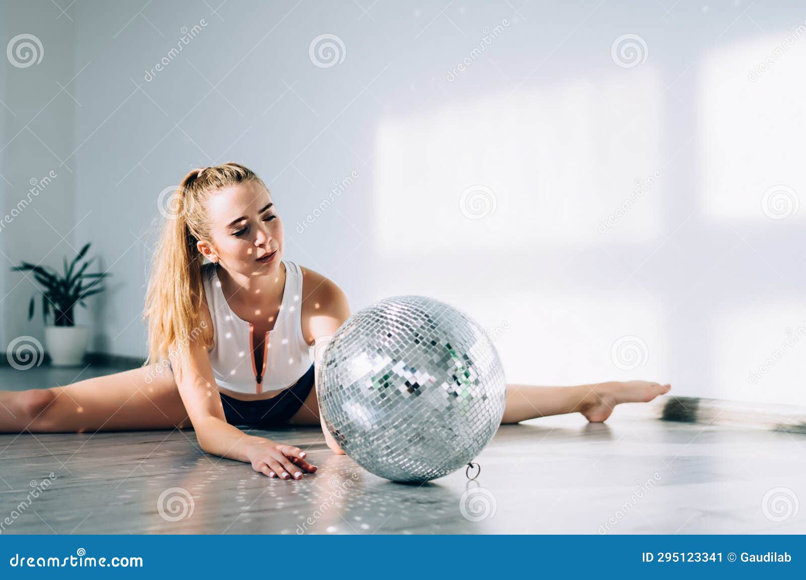 Slim Elegant Female Sitting before Disco Ball Stock Image - Image of ...