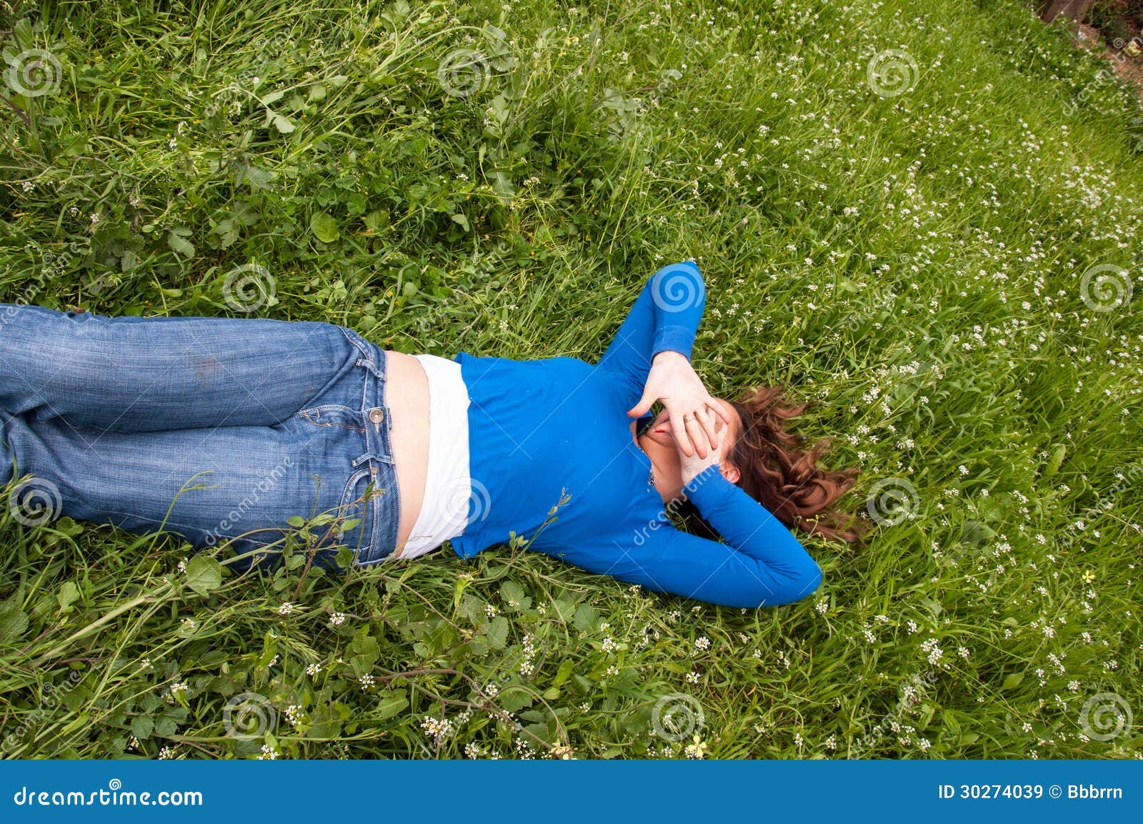 Woman laying on grass stock image. Image of girl, happiness - 30274039