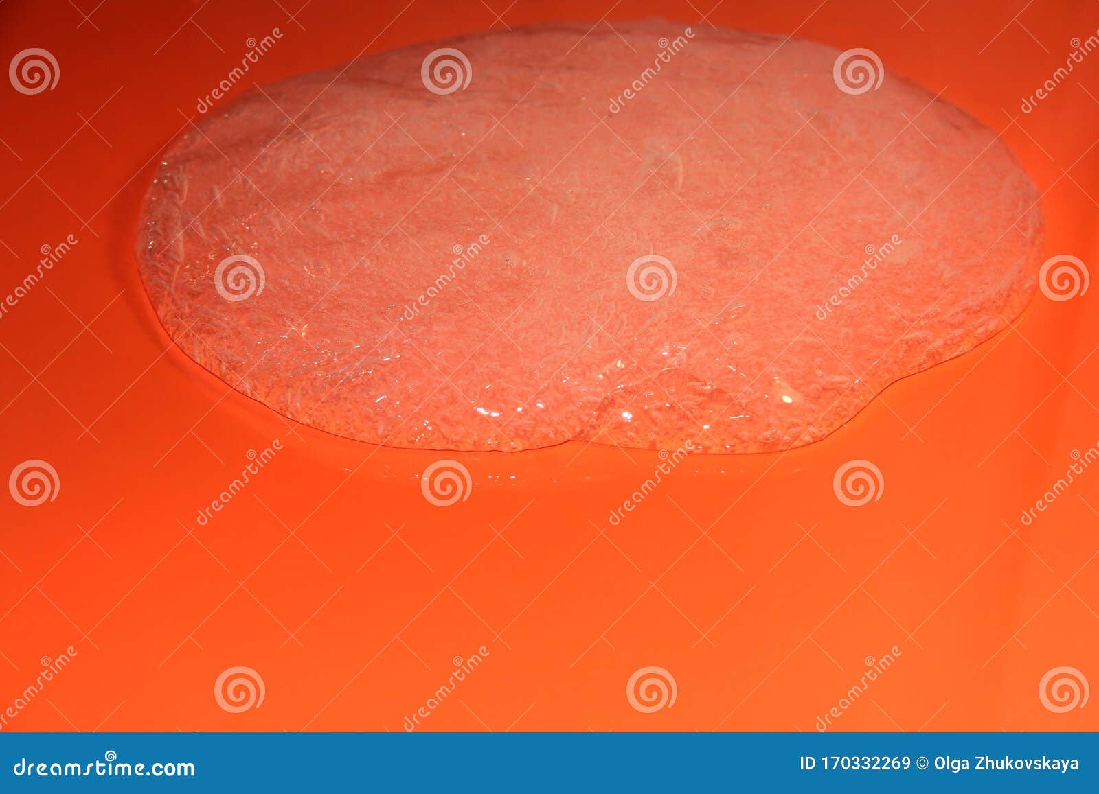Slime on an Orange Background. Snot White on a Bright Background Stock ...