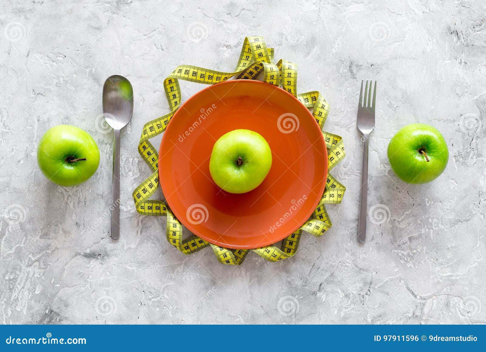 Slimming Diet. Apple at Plate and Measuring Tape on Grey Stone ...