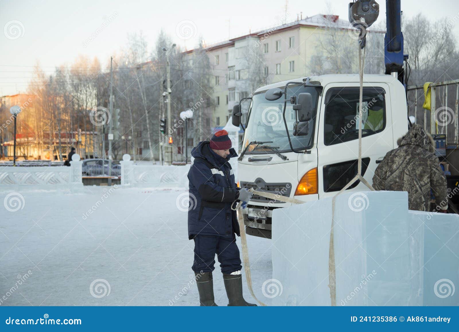 The Slinger Slings the Load with a Tape Sling Stock Photo - Image of ...