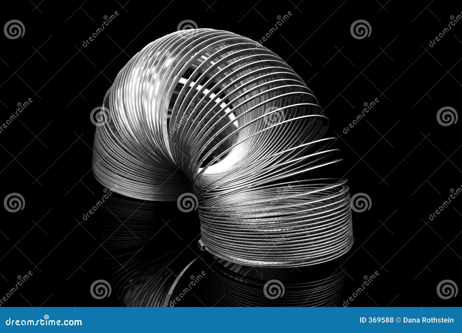 Slinky editorial stock photo. Image of round, abstract - 369588