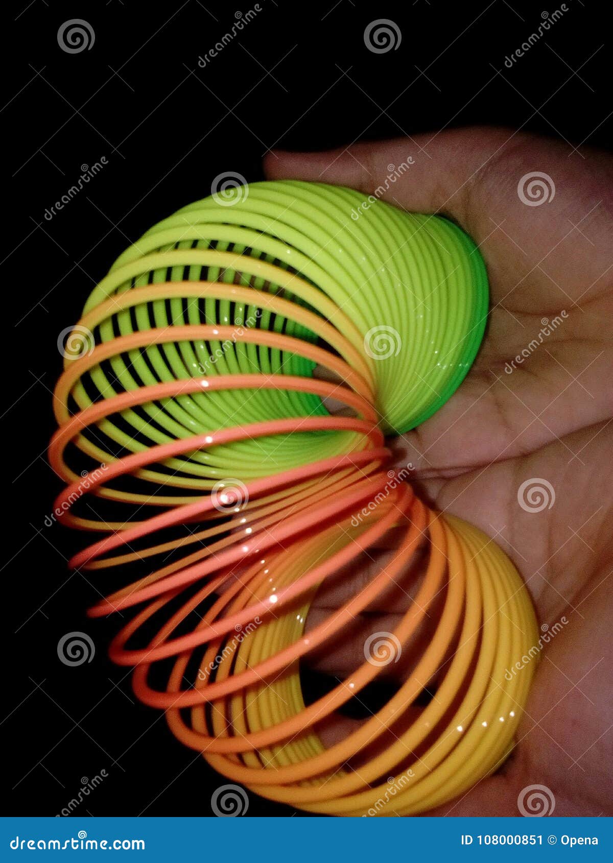 Slinky toy rainbow color editorial photo. Image of color - 108000851