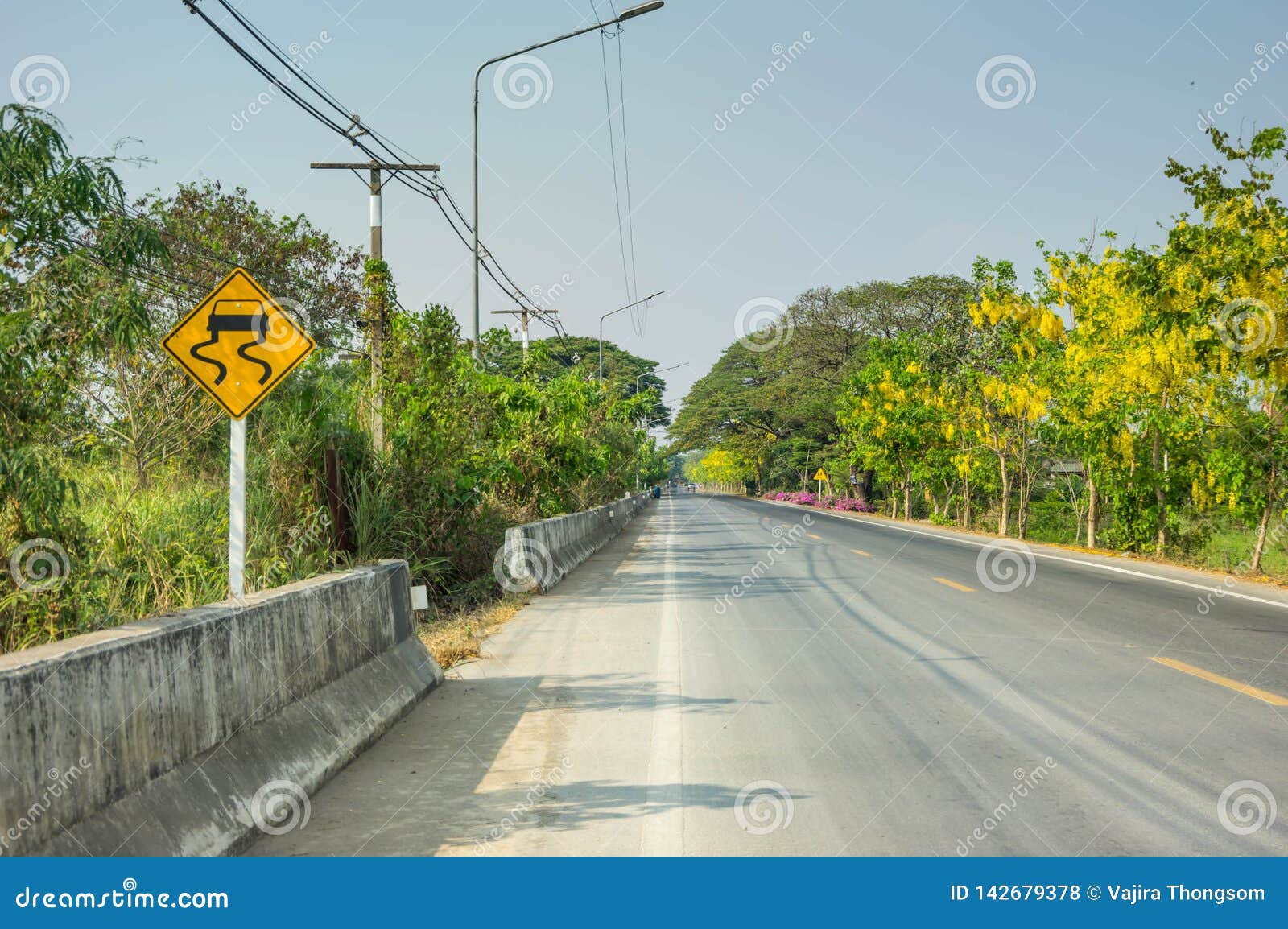 Slipery road traffic sign stock photo. Image of road - 142679378