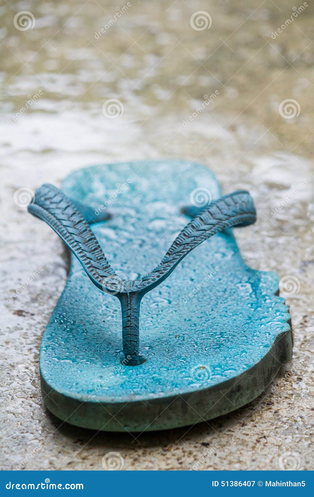 Slipper stock image. Image of raining, concrete, blue - 51386407