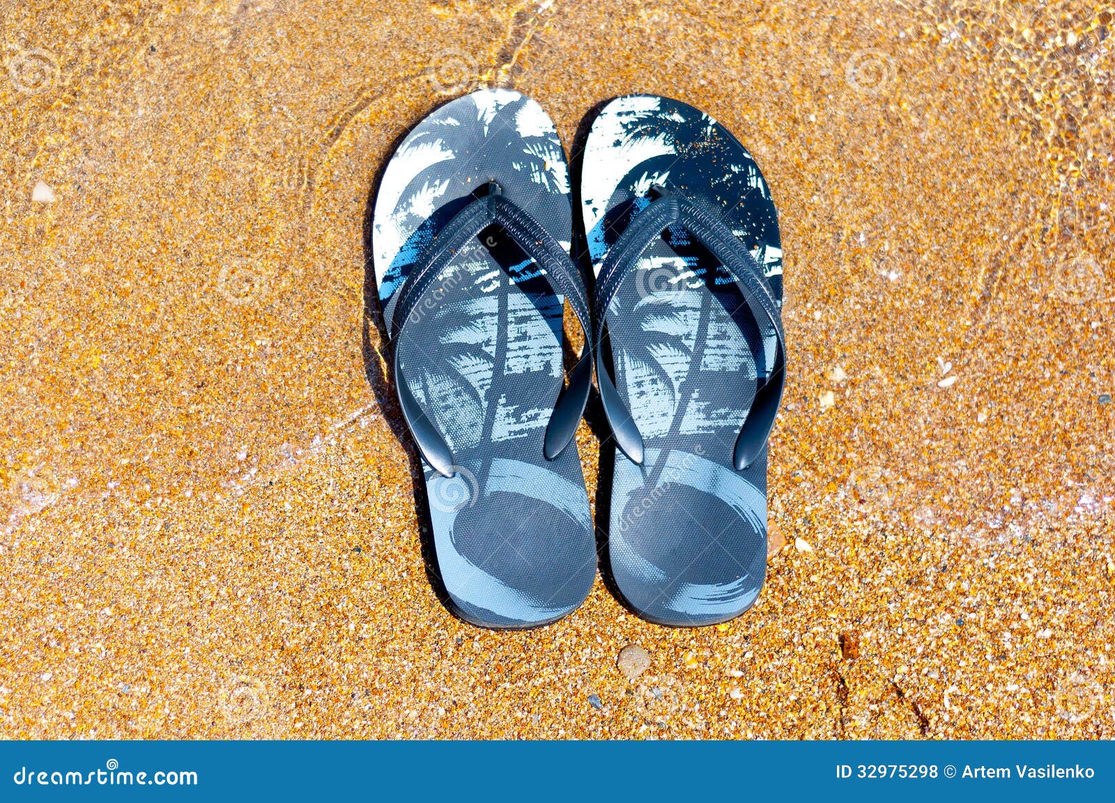 Slippers on the beach stock photo. Image of beach, shells - 32975298
