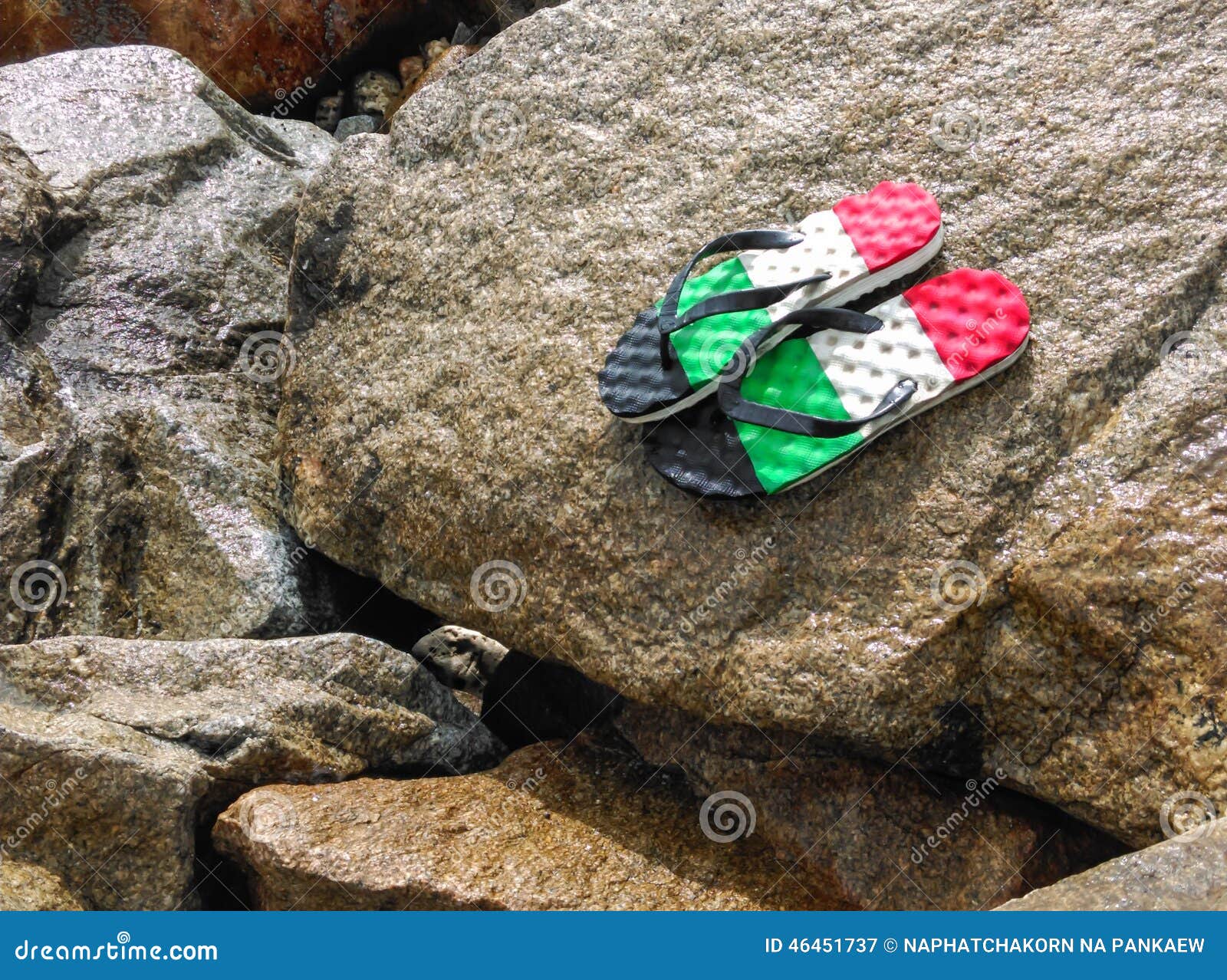 Slippers on the rocks stock image. Image of rocks, beach - 46451737