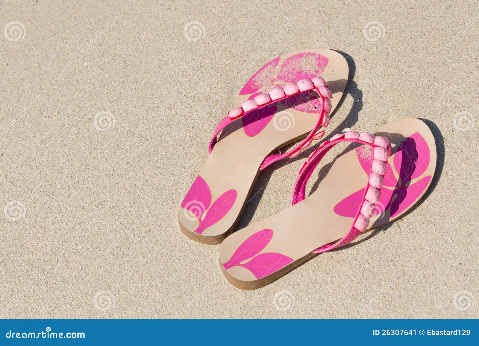 Slippers in the sand sea stock image. Image of sand, relax - 26307641