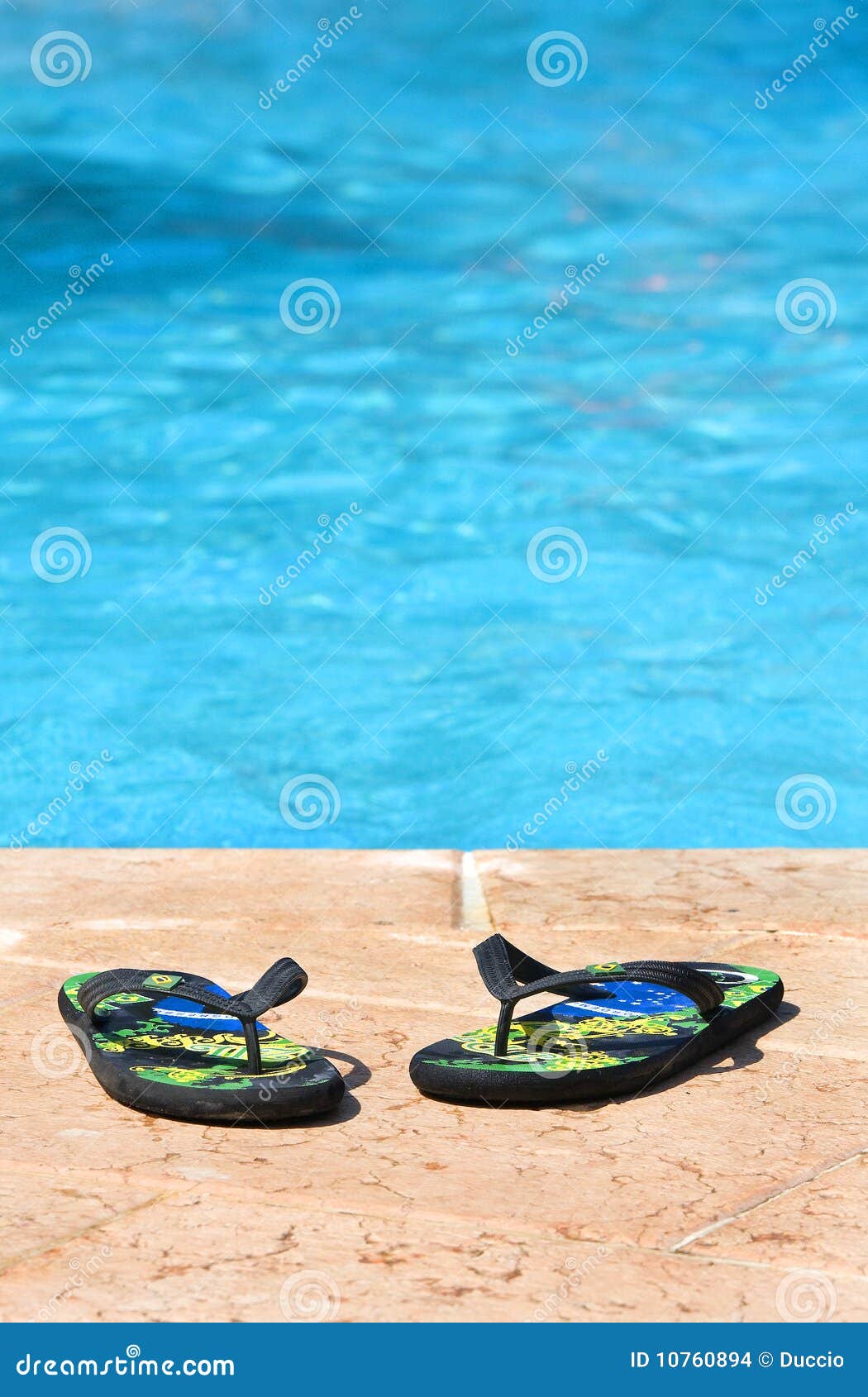 Slippers in the Swimming Pool Stock Photo - Image of edge, blue: 10760894