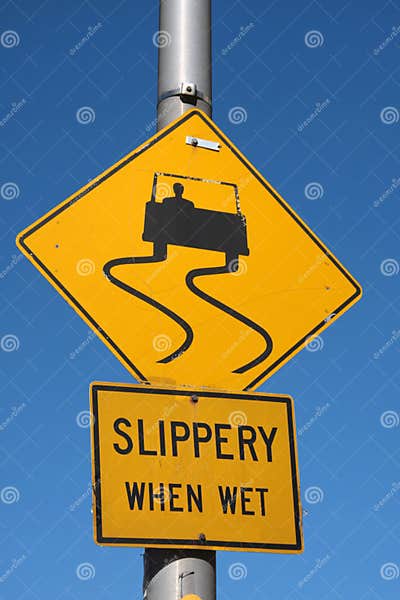 Slippery when wet stock image. Image of emergency, street - 14267399