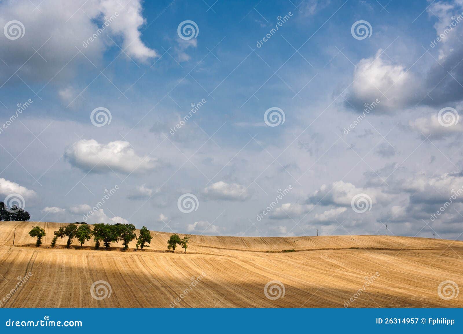Sloping Field with Impressive Sky and Clouds Stock Image - Image of ...