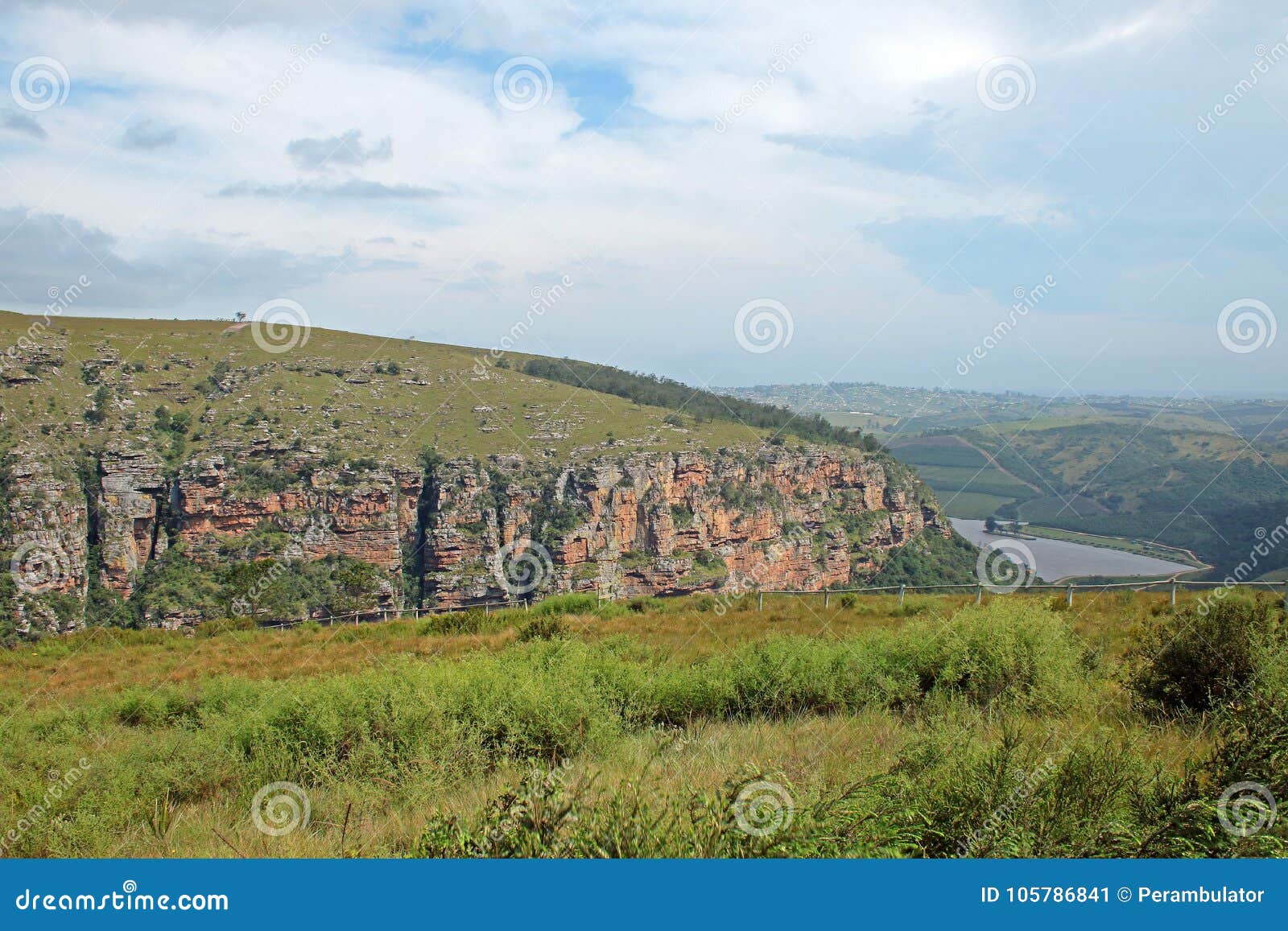 SLOPING HILL with DAM in the DISTANCE Stock Image - Image of daytime ...
