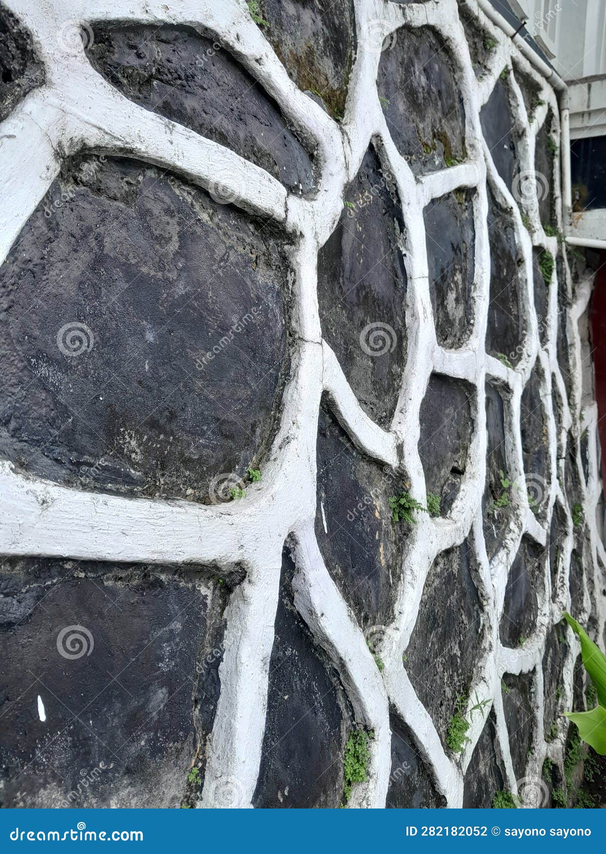 The Sloping Stone Building is Red and White in Color, Which Has a ...