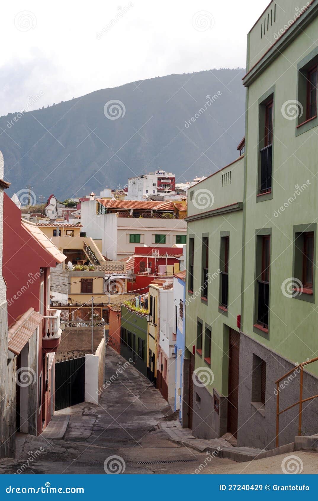 Sloping street stock image. Image of window, blue, village - 27240429