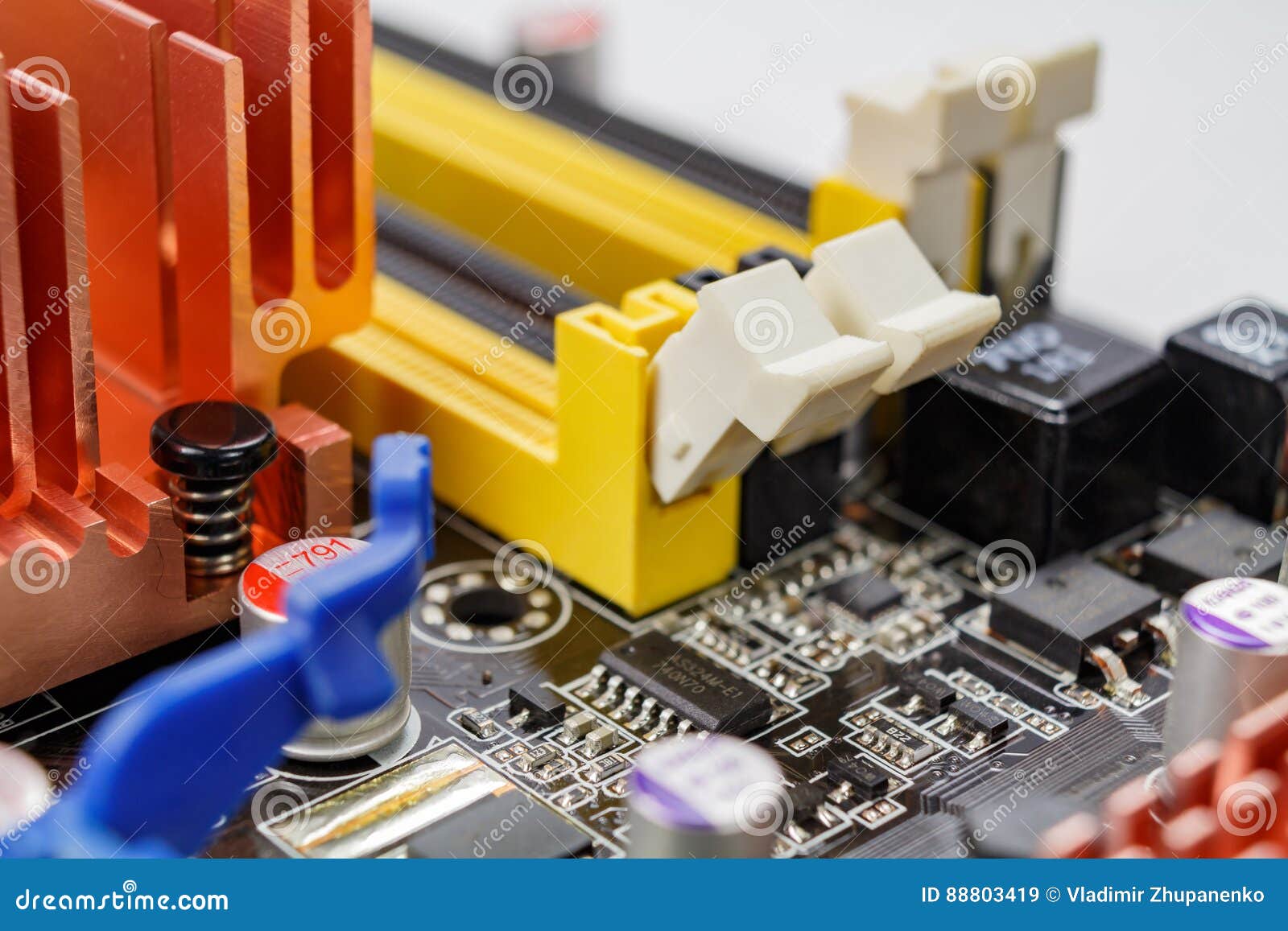 Installing DDR Memory On Motherboard. Hand Pushes The Module Into The ...