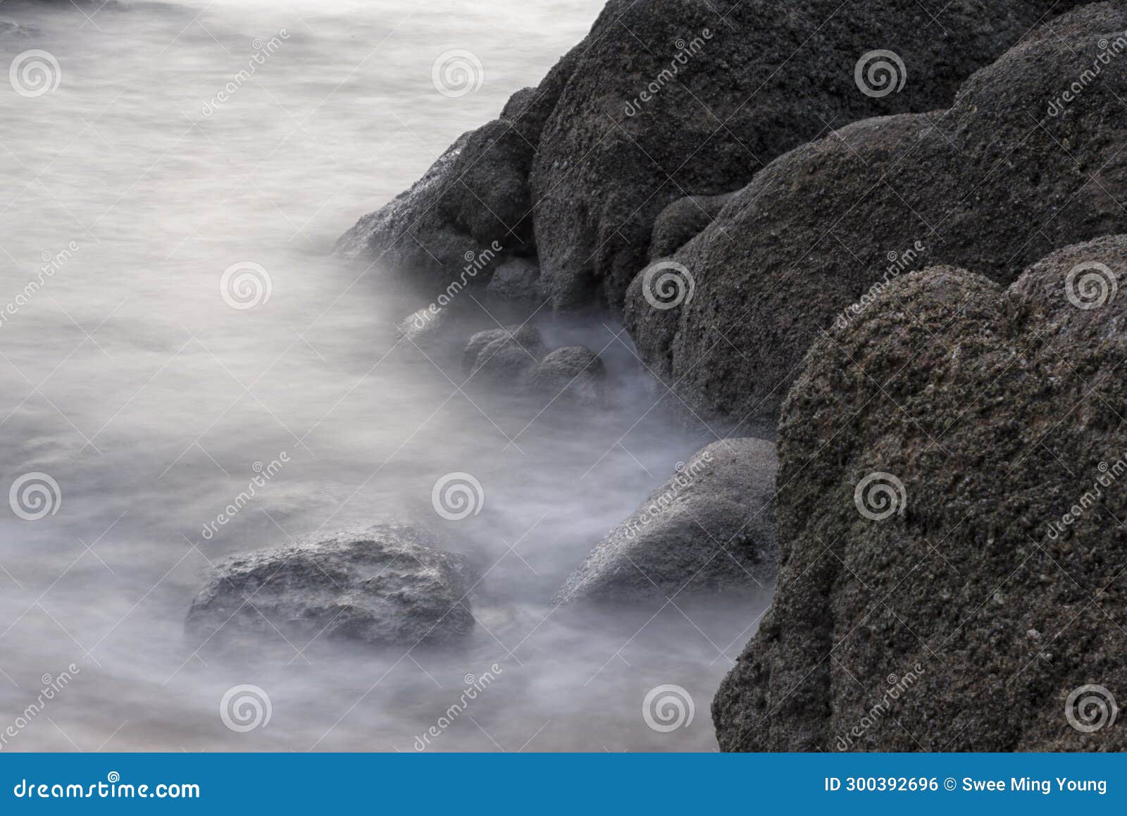 Slow Exposure Shots of the Sea Waves Along the Rocky Beach. Stock Photo ...
