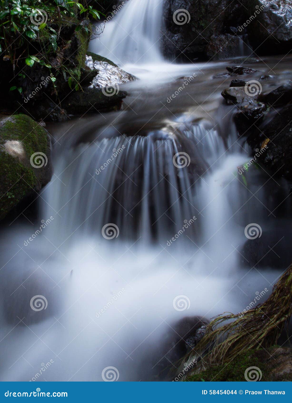 Slow flowing waterfall stock photo. Image of landscape - 58454044