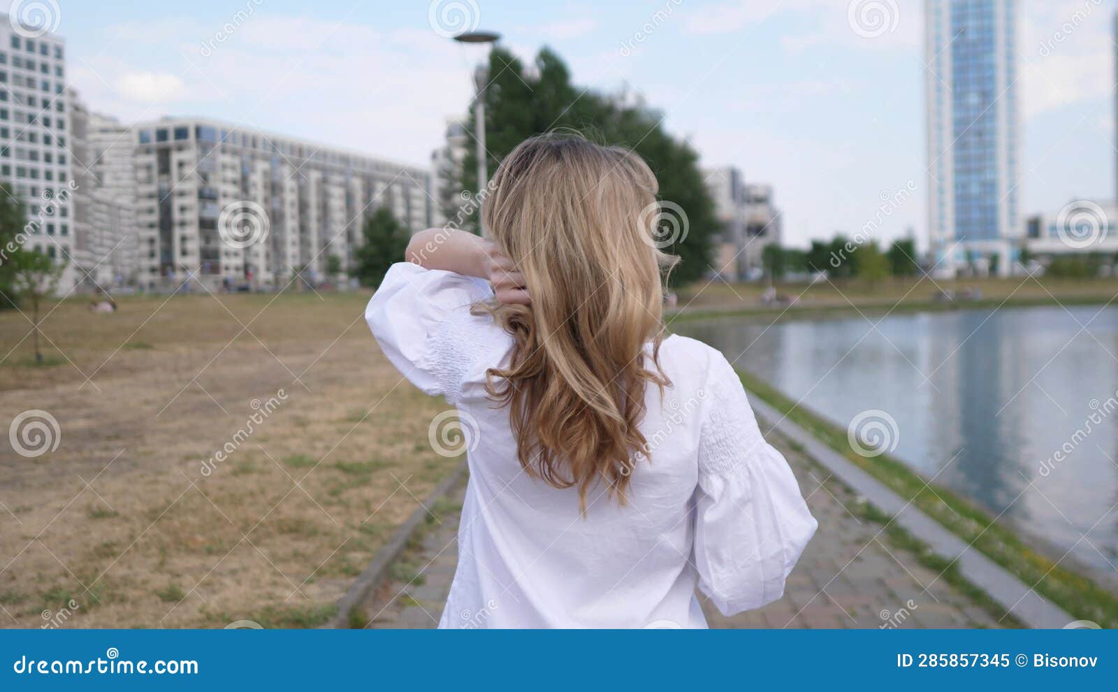 Slow Motion Blonde Girl Walking on the Sidewalk Stock Video - Video of ...