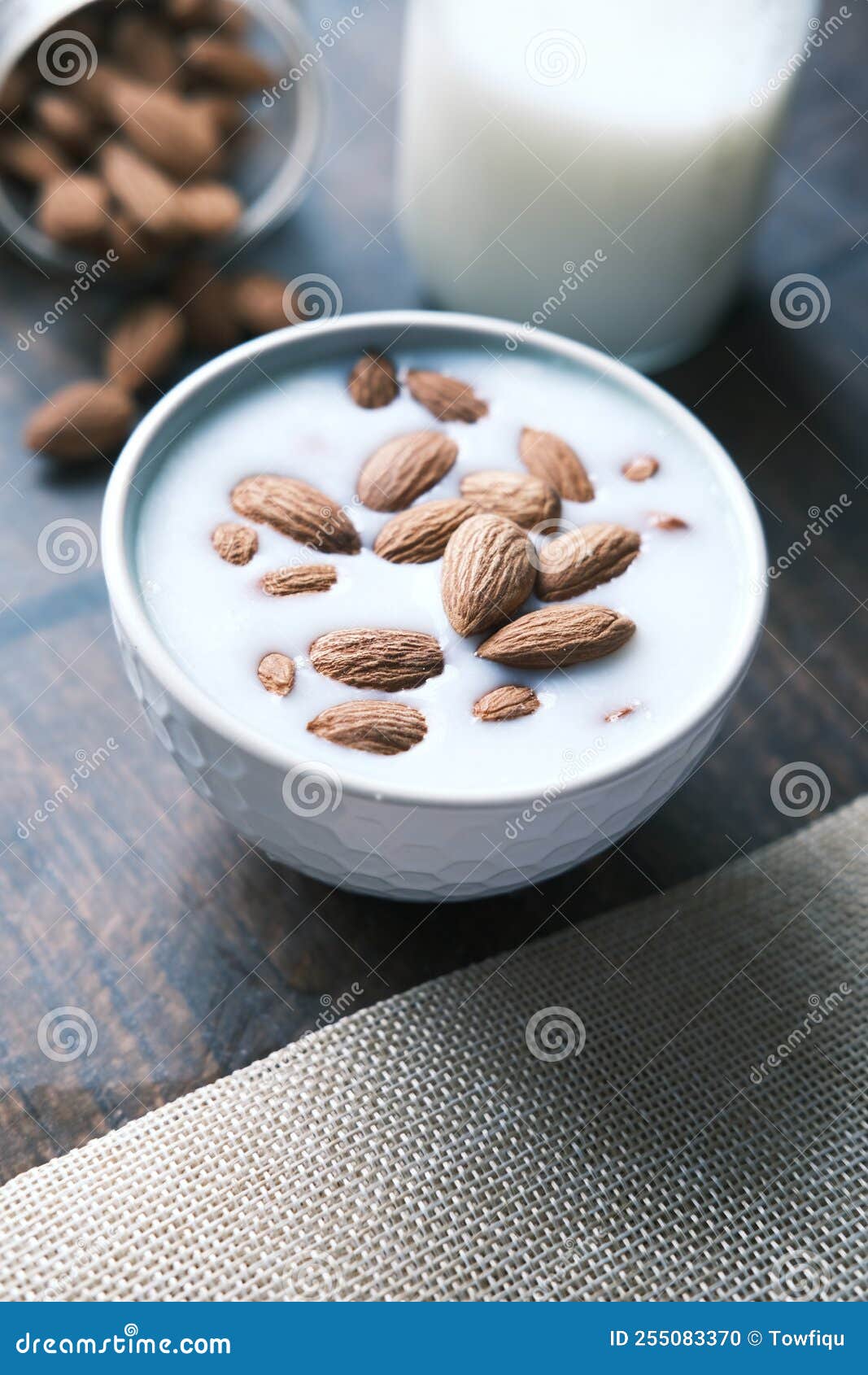 Slow Motion of Pouring Almond Nuts in a Milk Stock Photo - Image of ...
