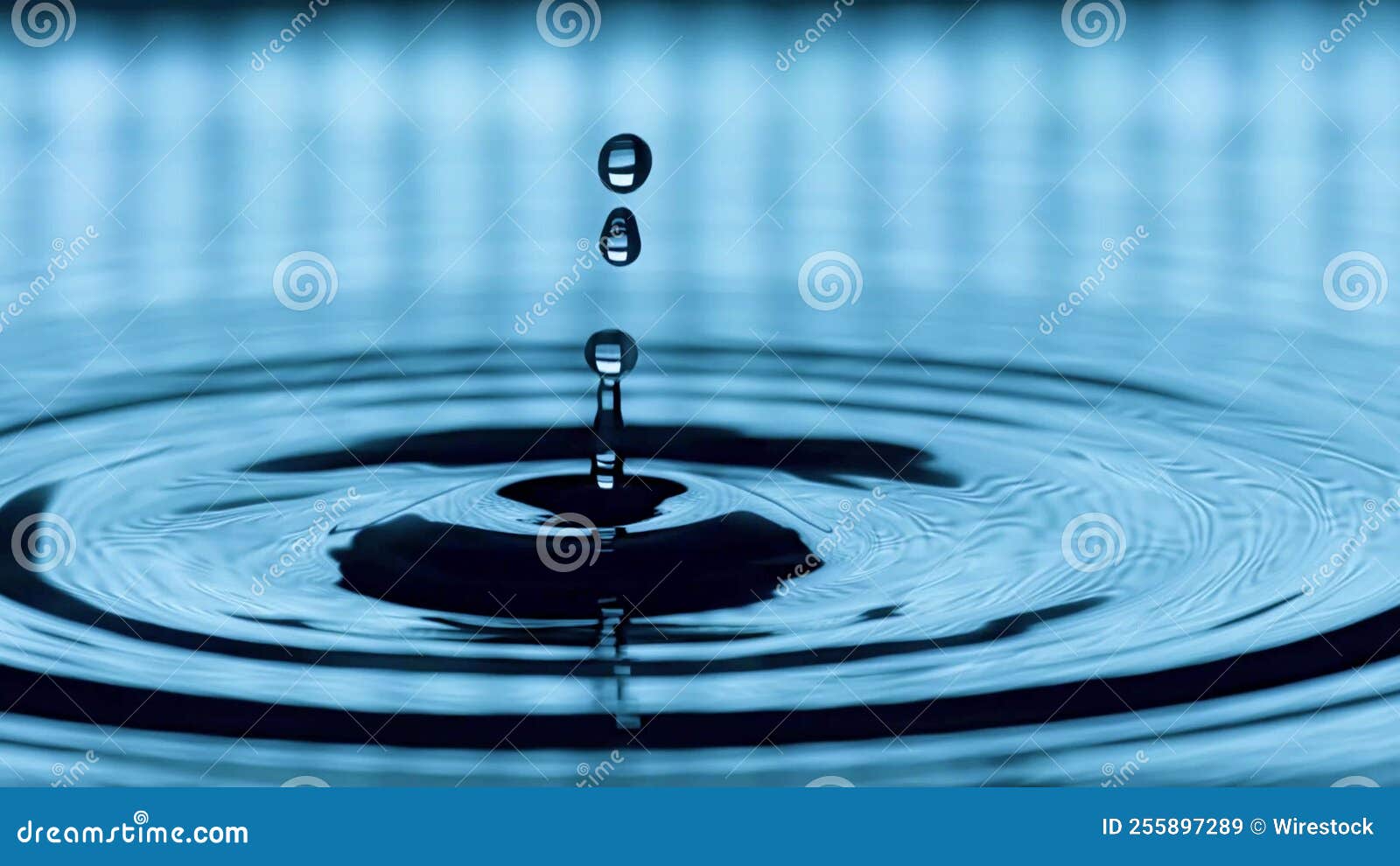 Slow-motion Shot of a Water Drop Falling into the Water and Making ...