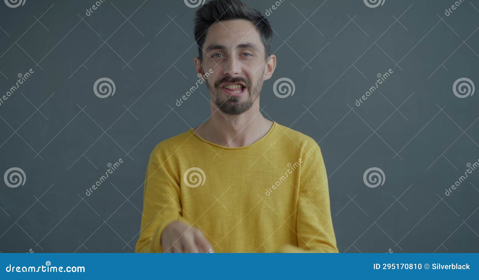 Slow Motion of Silly Guy Making Funny Faces and Looking at Camera ...