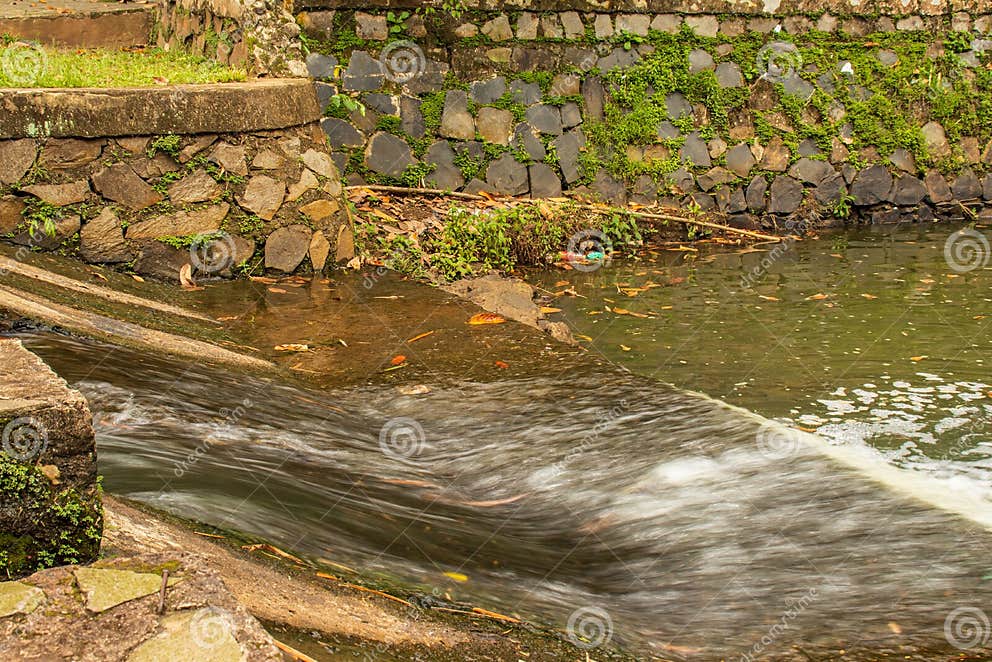 Slow Motion of Water Sliding from a Small Dam Stock Image - Image of ...