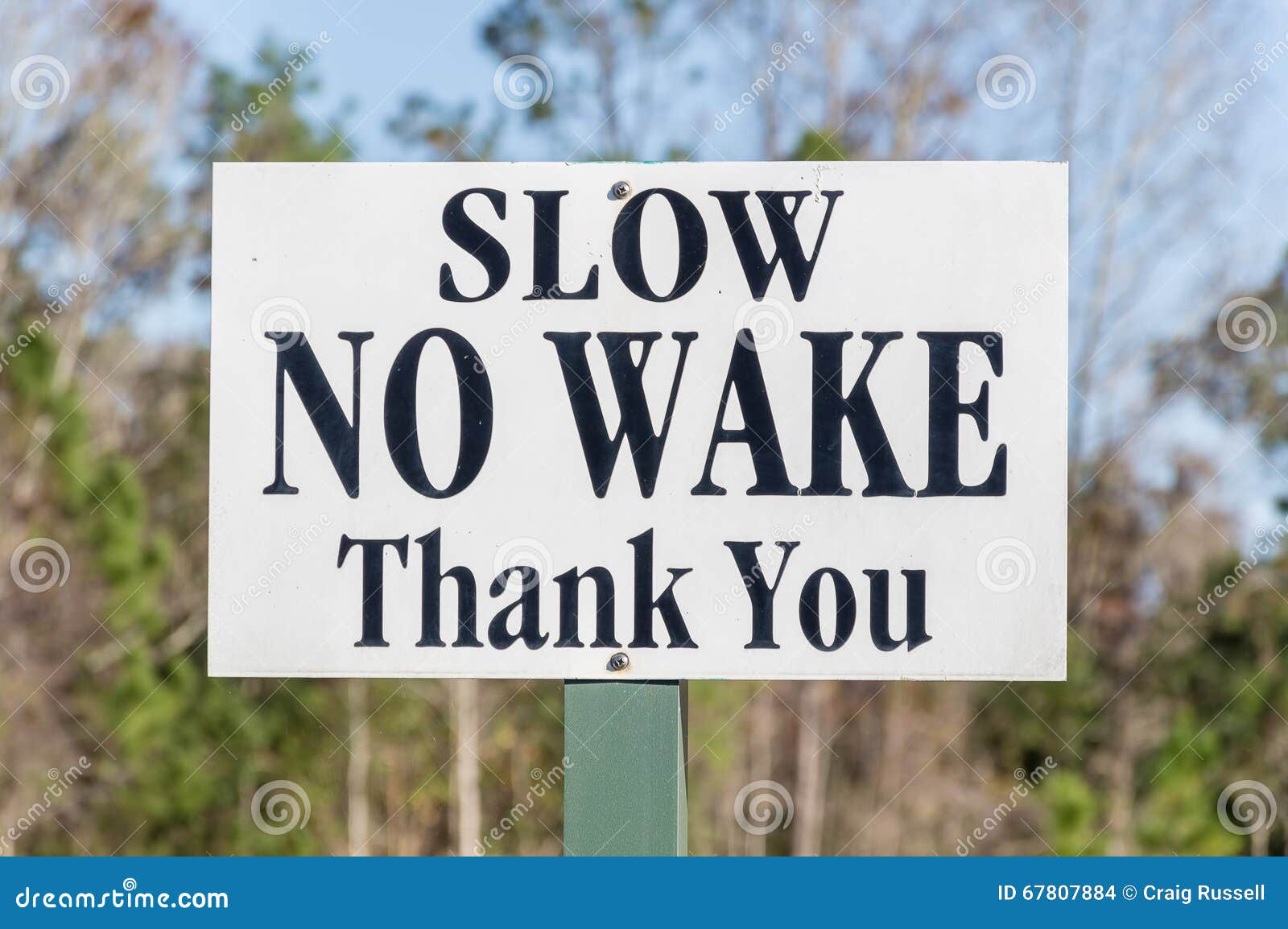 Slow No Wake sign stock photo. Image of zone, thank, idle - 67807884