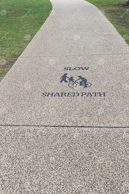 Slow, Shared Path Signage on a Pedestrian and Bicycle Path Stock Image ...