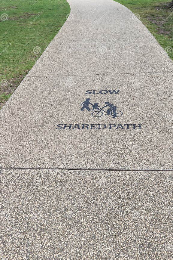 Slow, Shared Path Signage on a Pedestrian and Bicycle Path Stock Image ...