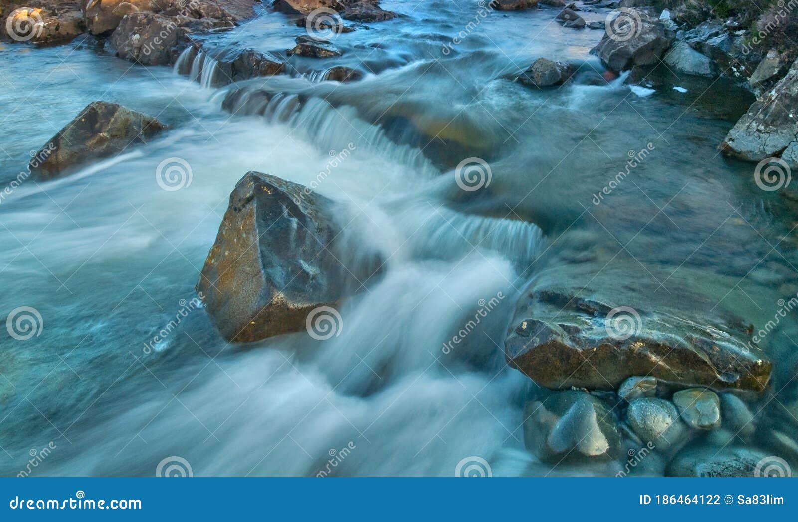 Slow Shutter Water Stream and through Rocks Stock Photo - Image of ...