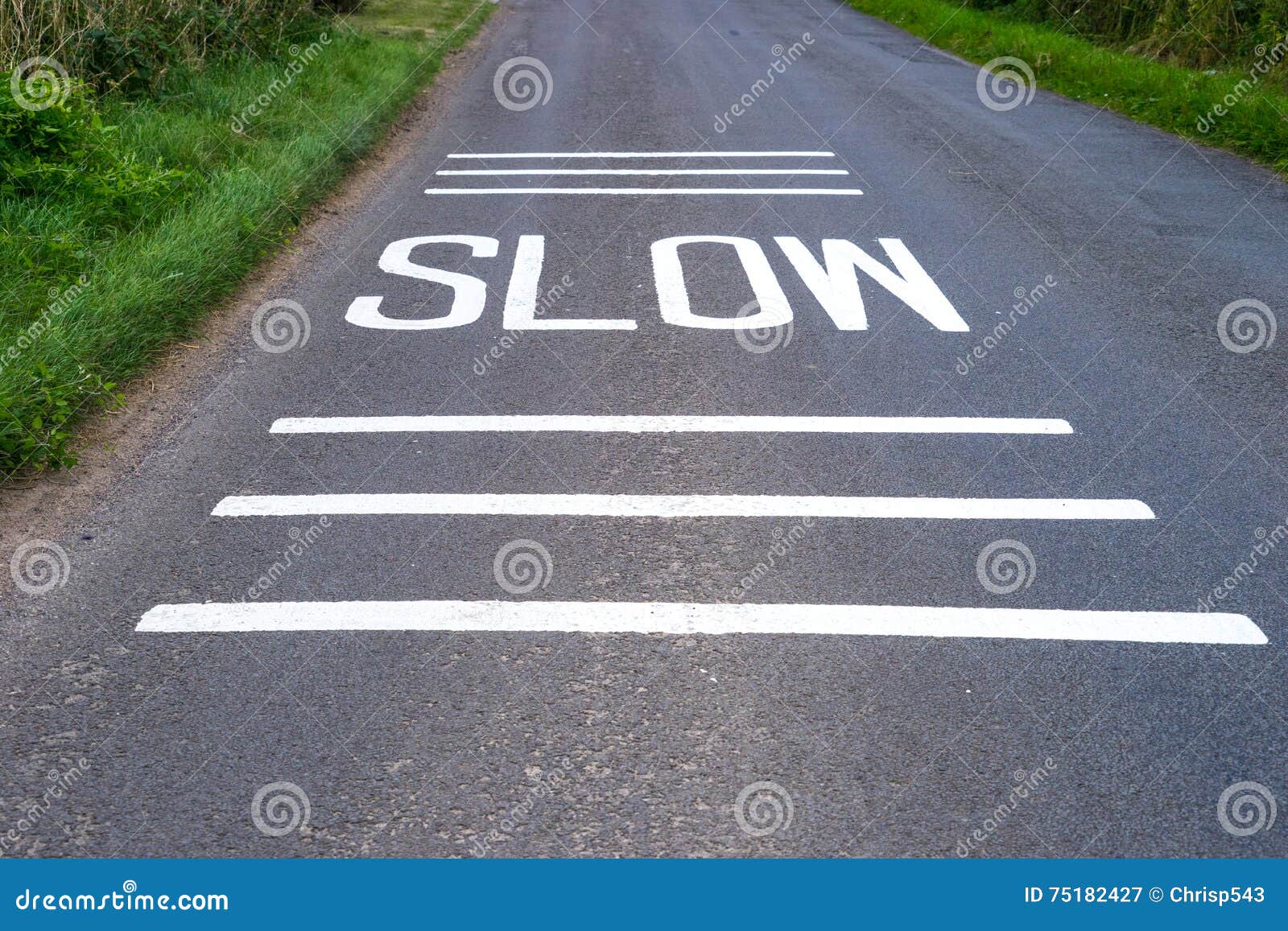 Slow Sign Freshly Painted on Road Stock Image - Image of dangerous ...